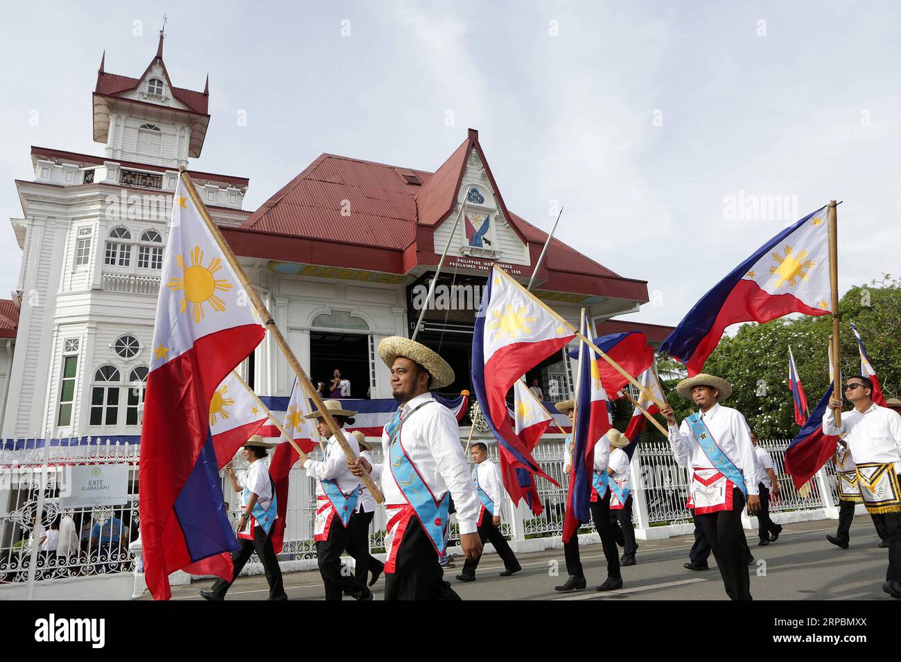 (190612) -- CAVITE PROVINCE, June 12, 2019 -- People wave the national ...