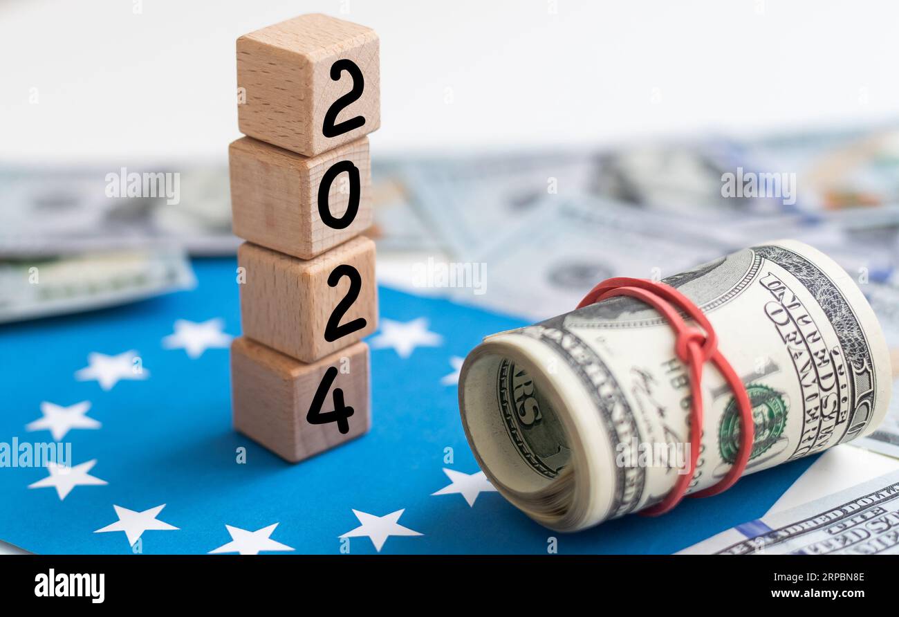 Finance stack 2024 wood cube on white background. New year 2024 ...