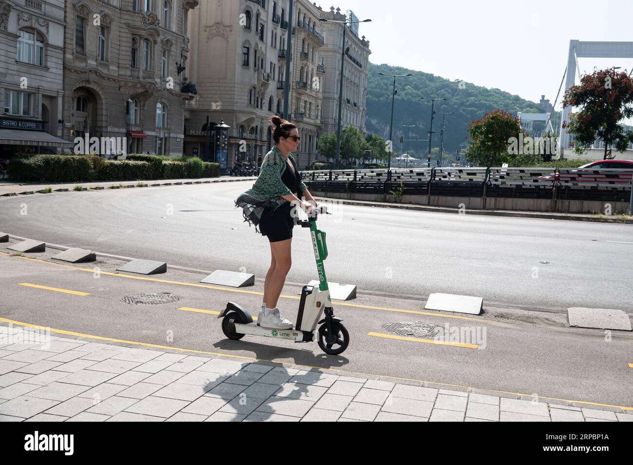 Scooters through the streets hi-res stock photography and images - Alamy