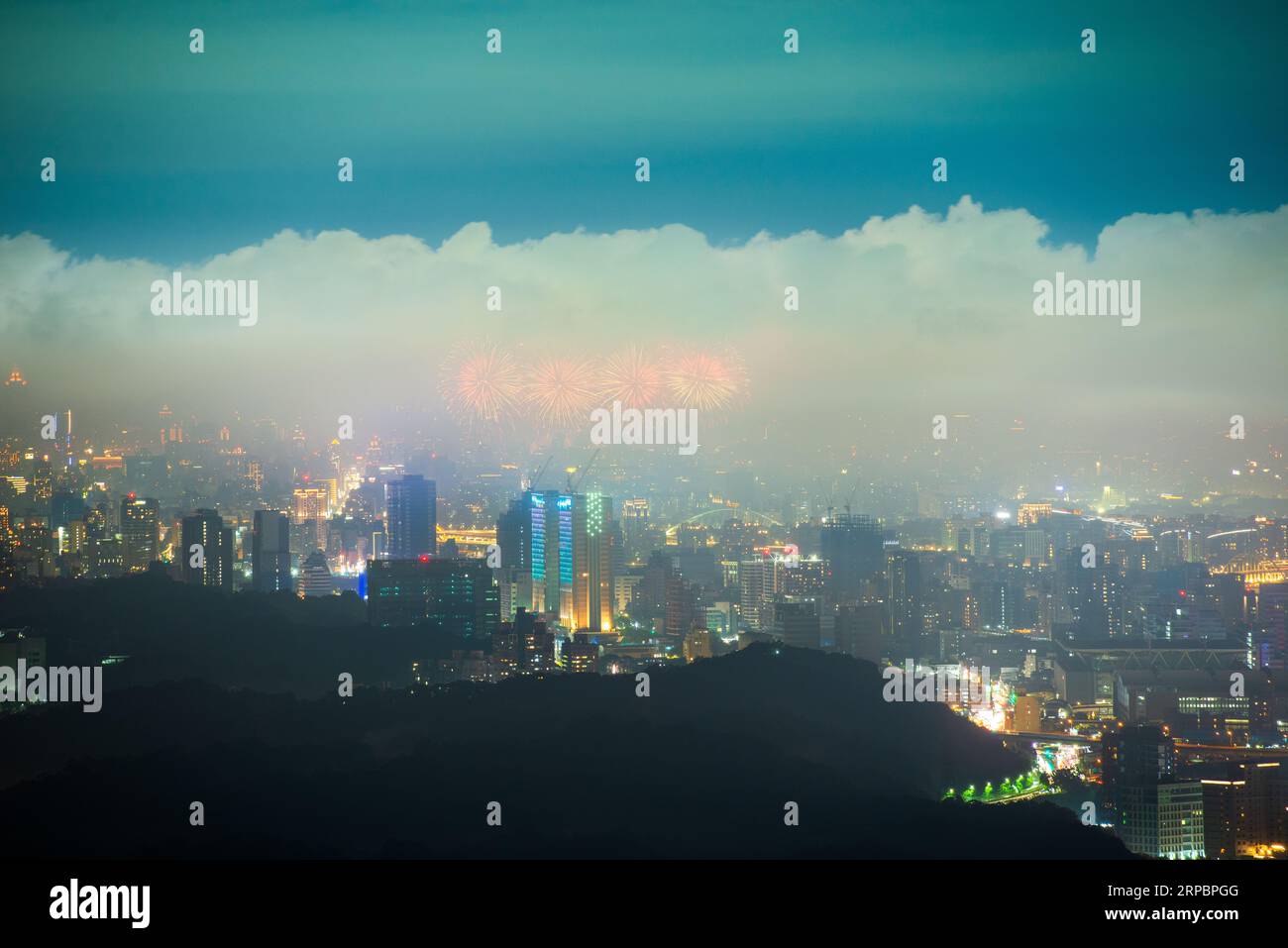 Urban Splendor at Night: Watching Dynamic Clouds Above a Dazzling ...