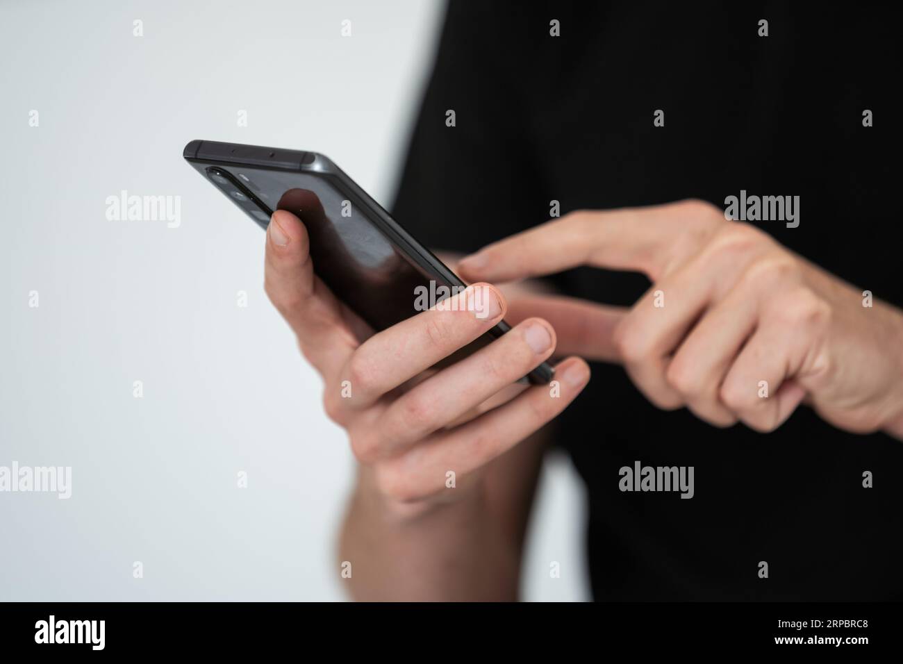 Man forefinger swiping phone screen. Male checking social media ...