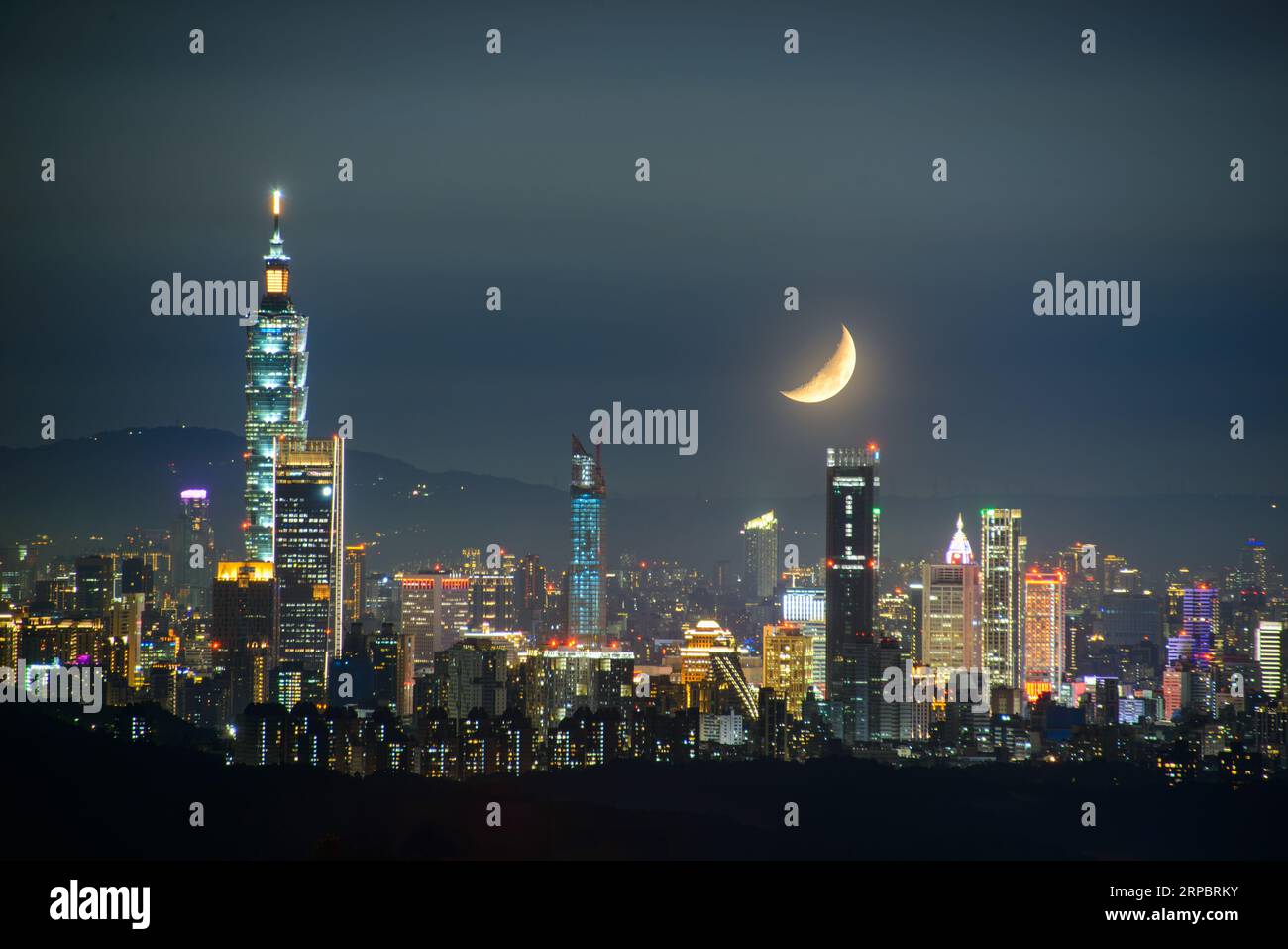 City Lights At Night With Moon