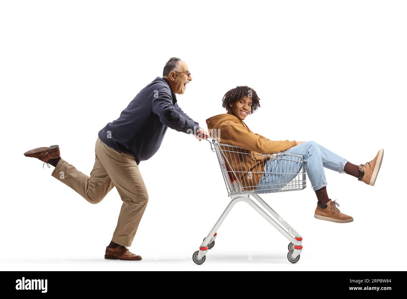 Mature man running and pushing an african american young man inside a ...