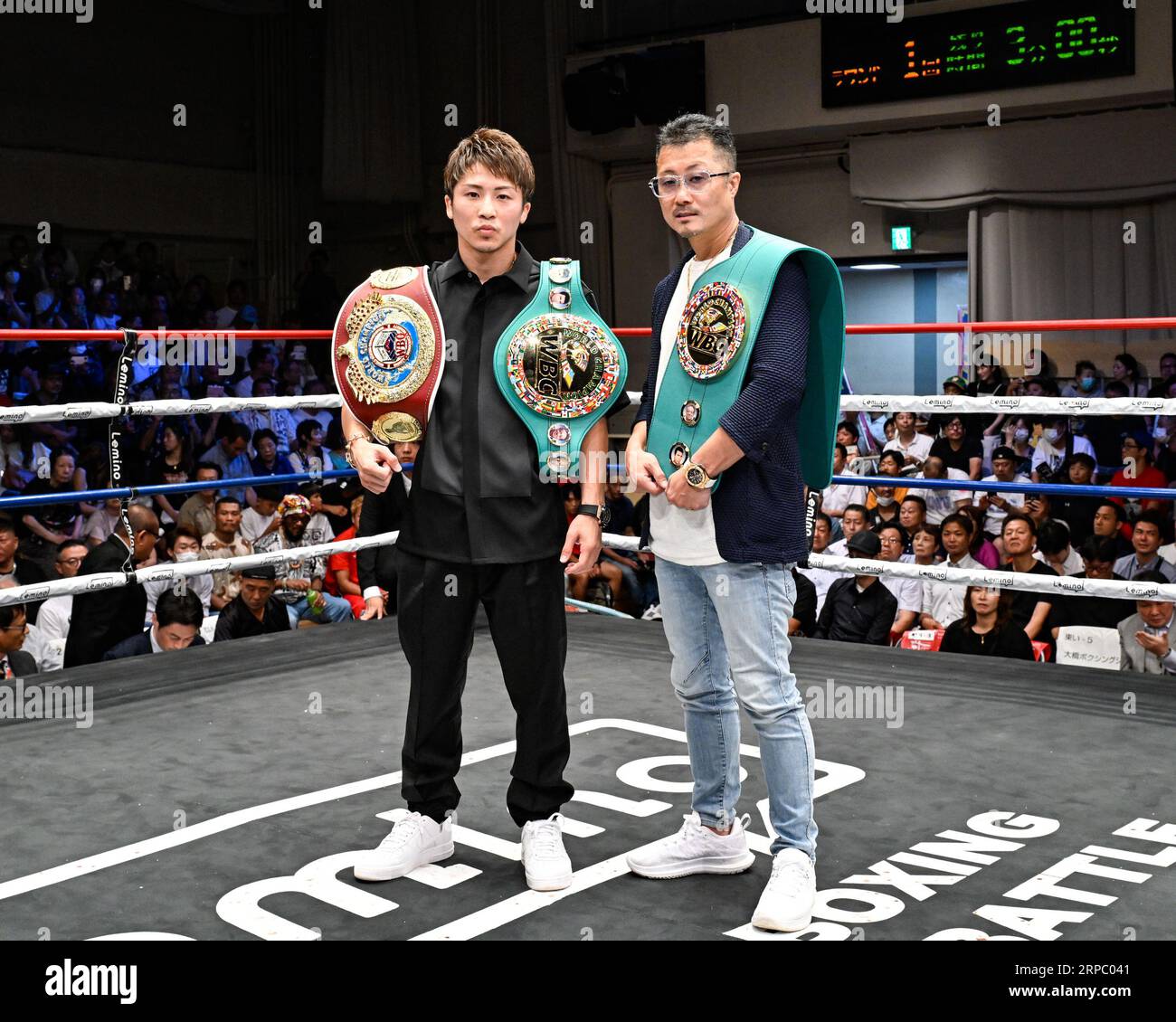 WBC and WBO super bantamweight champion Naoya Inoue of Japan, left ...