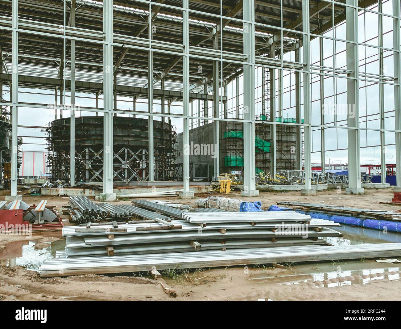 construction of an industrial foundation at a factory. large, metal ...