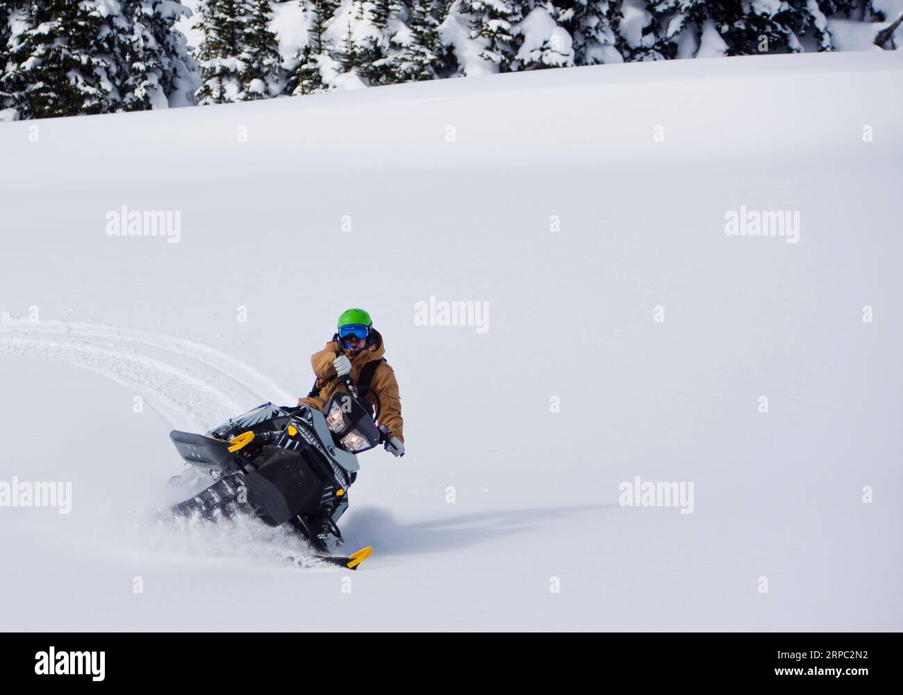 Adult man snowmobile hi-res stock photography and images - Alamy