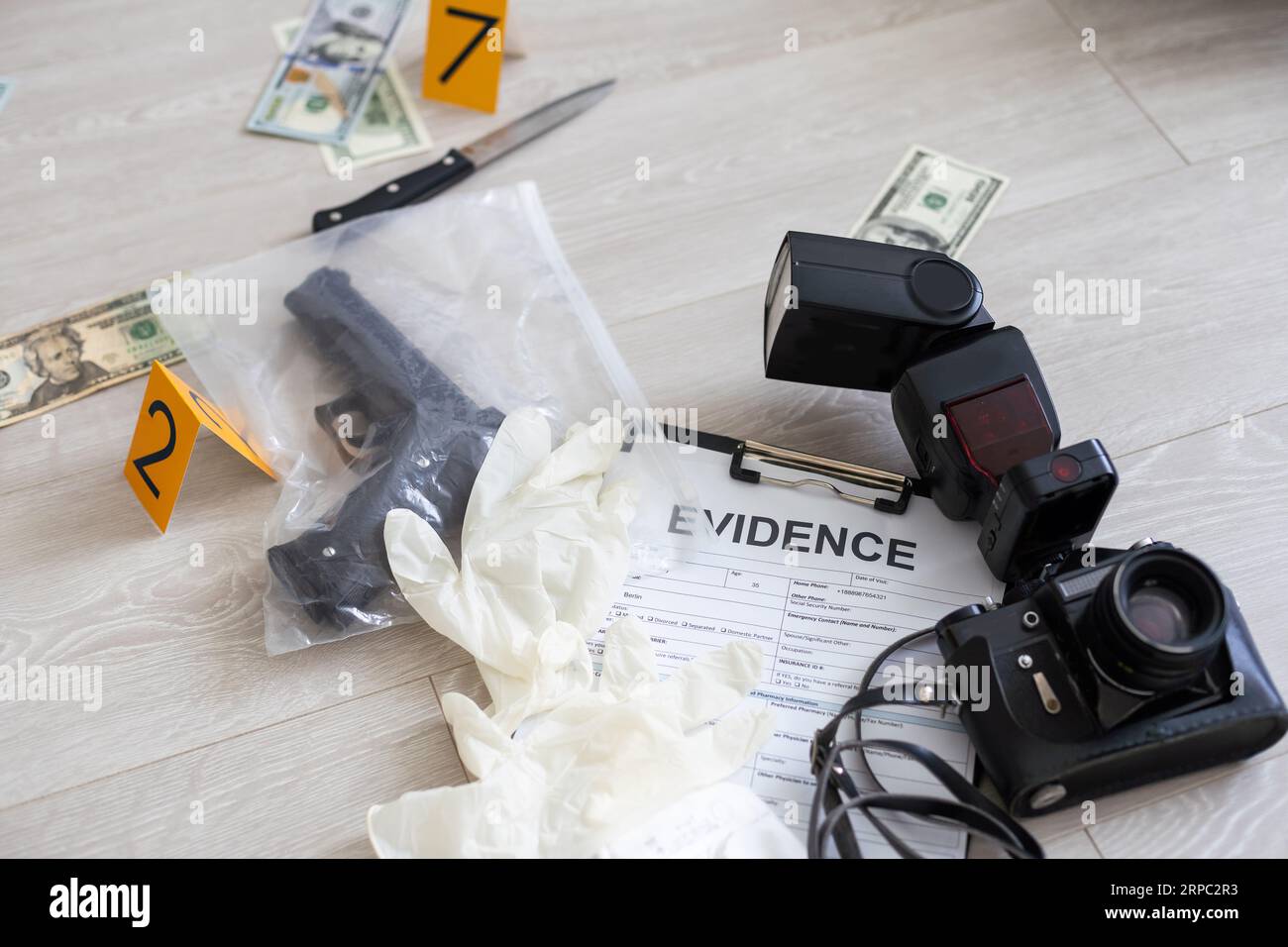 collecting evidence standing behhind yellow crime scene tape Stock ...