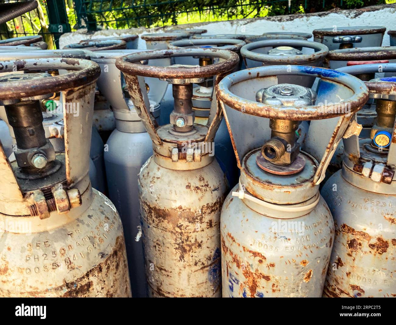 metal barrels at the construction site, fire cylinders. large ...
