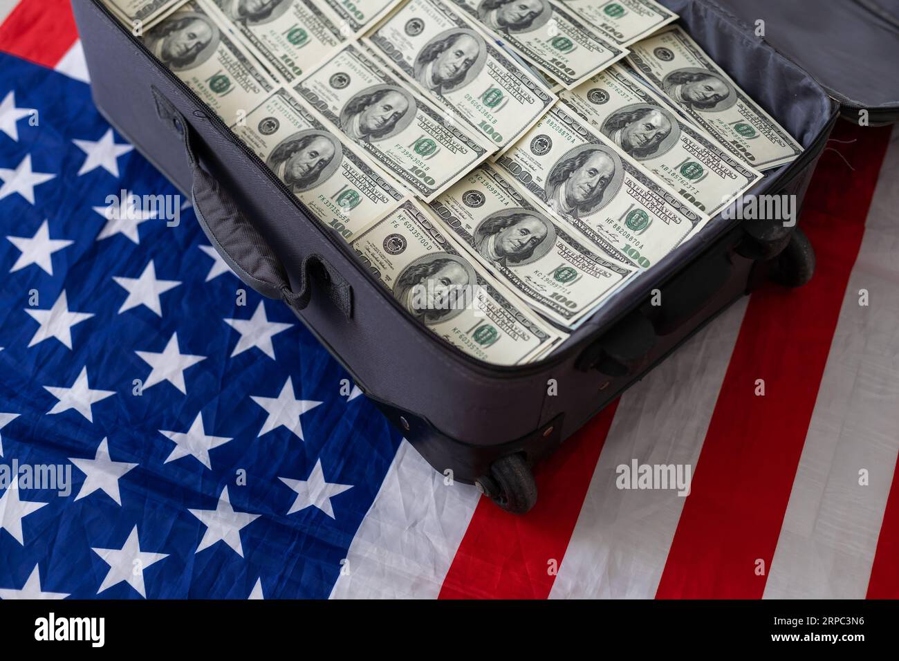 Open suitcase with one million dollars bills stacks Stock Photo - Alamy