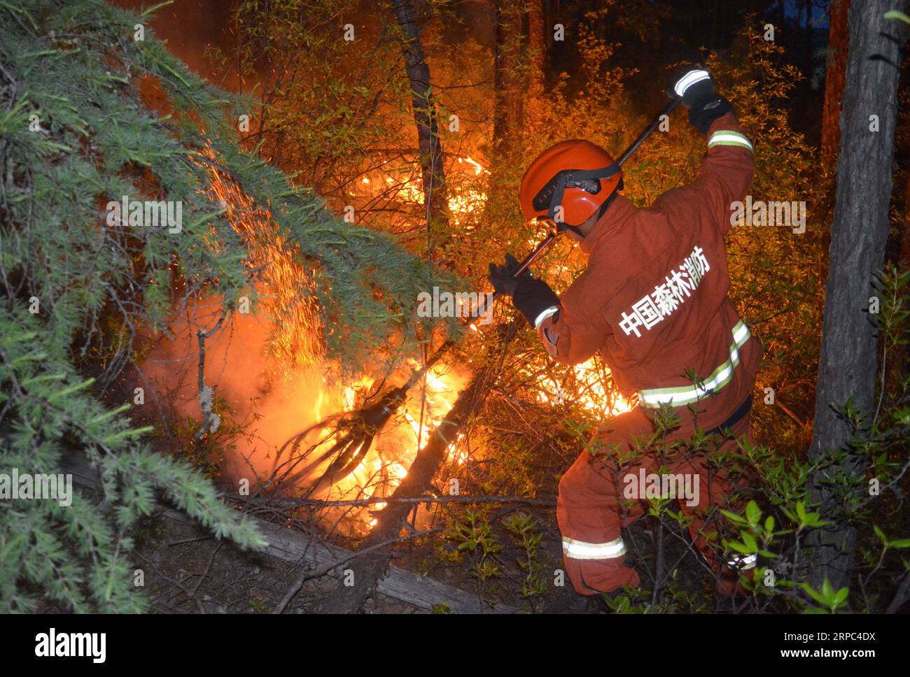Extinguishing photos hi-res stock photography and images - Alamy