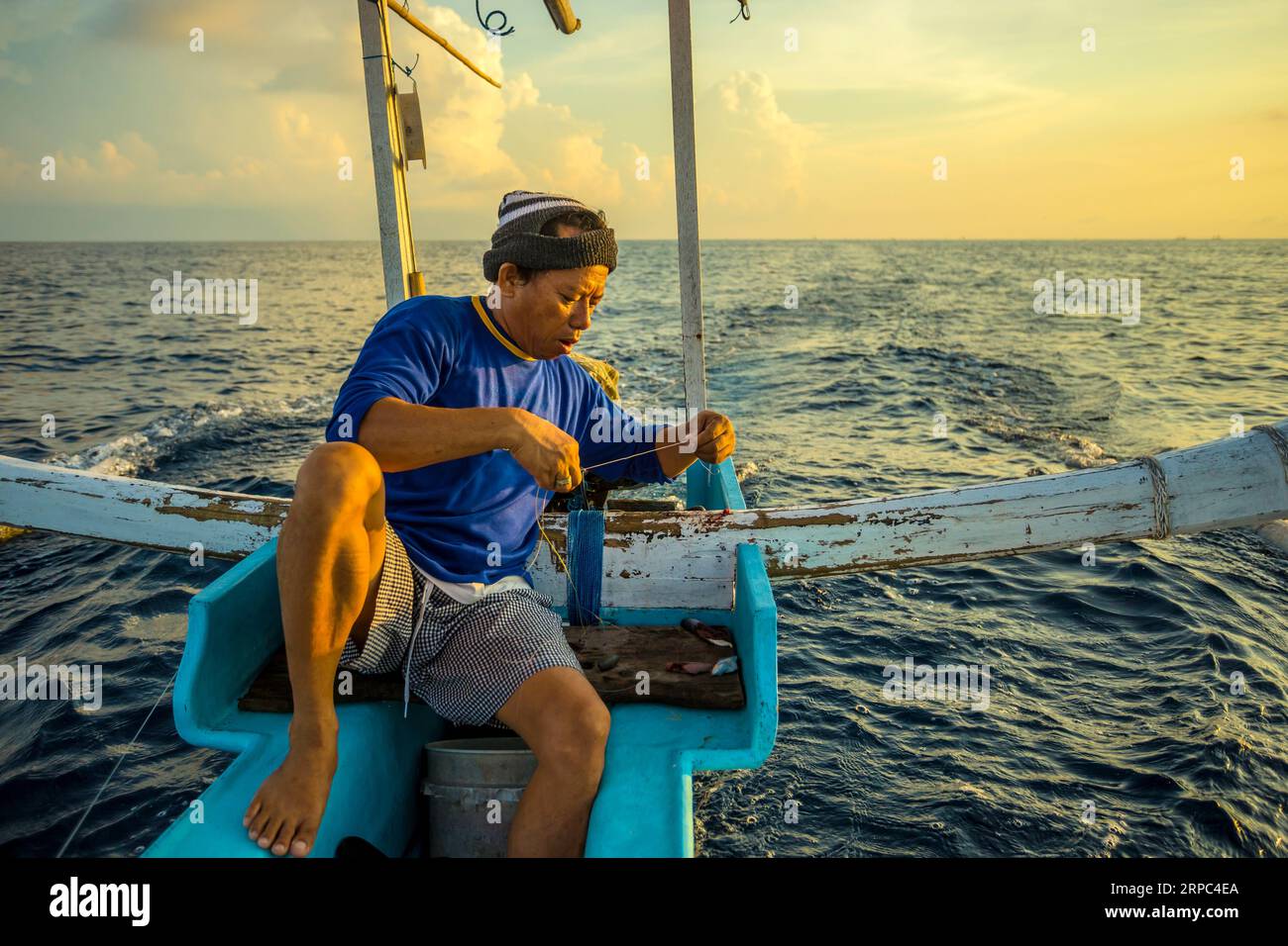 Balinese traditional fishing Stock Photo - Alamy
