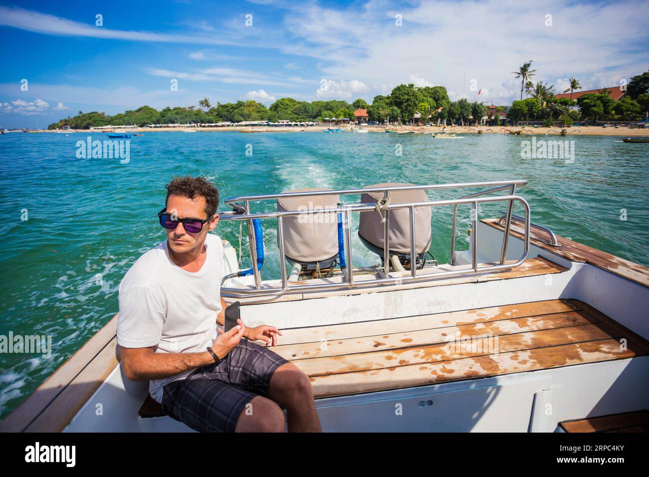 Man relaxing i on the boat Stock Photo - Alamy