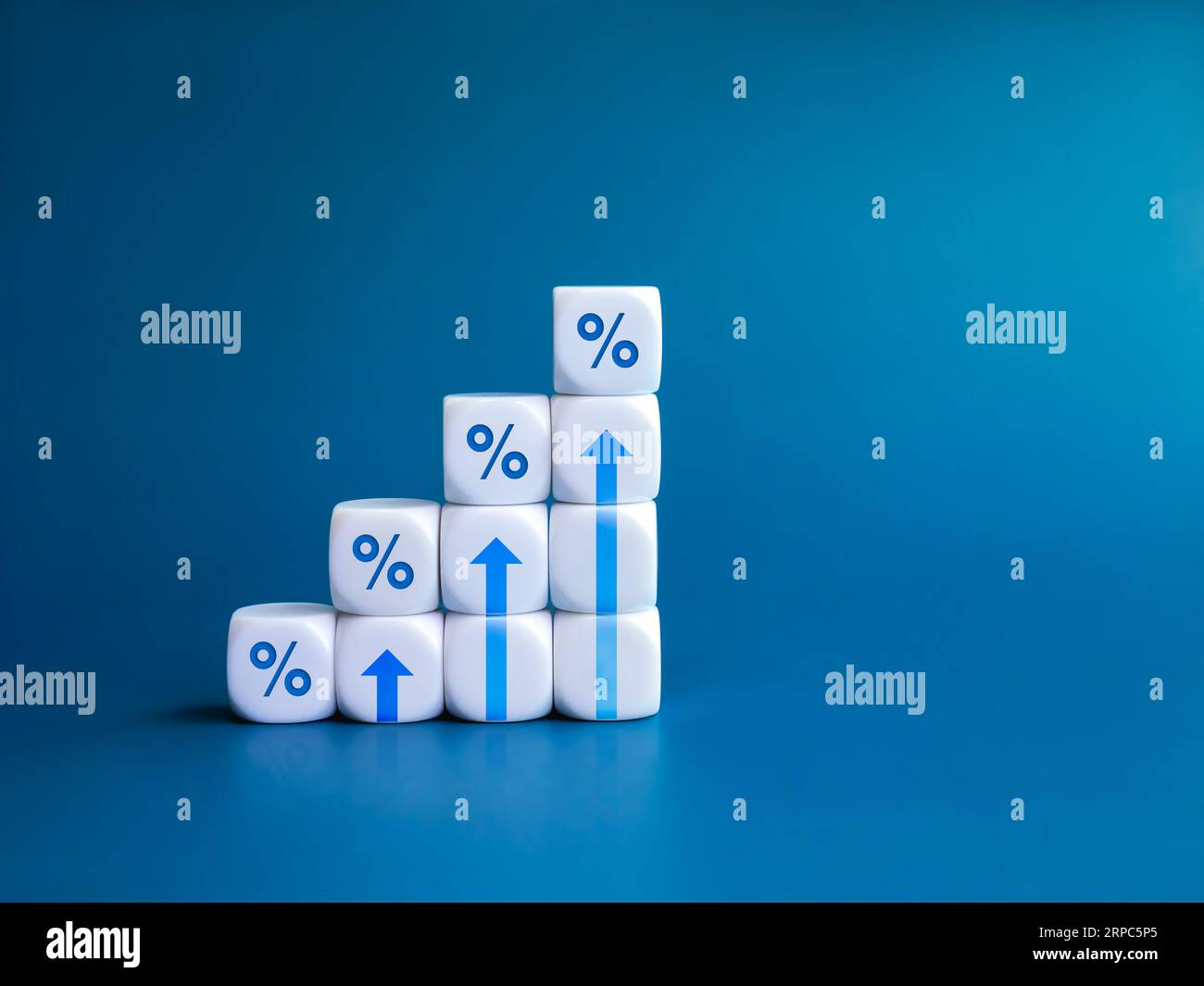 Rise up arrow on white cube blocks, bar graph chart steps with ...