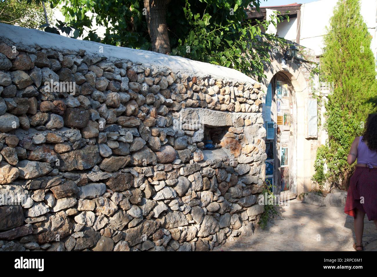 The street and door of Can Yucel's house in Old Datca, a Turkish writer ...
