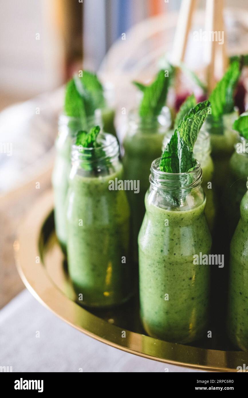 Healthy green smoothie in bottles hi-res stock photography and images ...