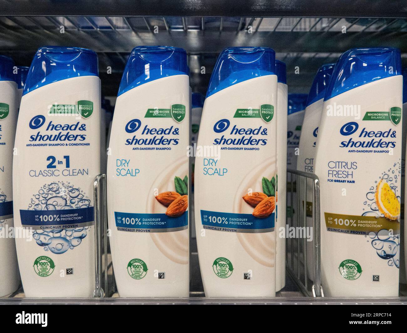 Head and shoulders shampoo on a shelf in a supermarket. Close up image ...