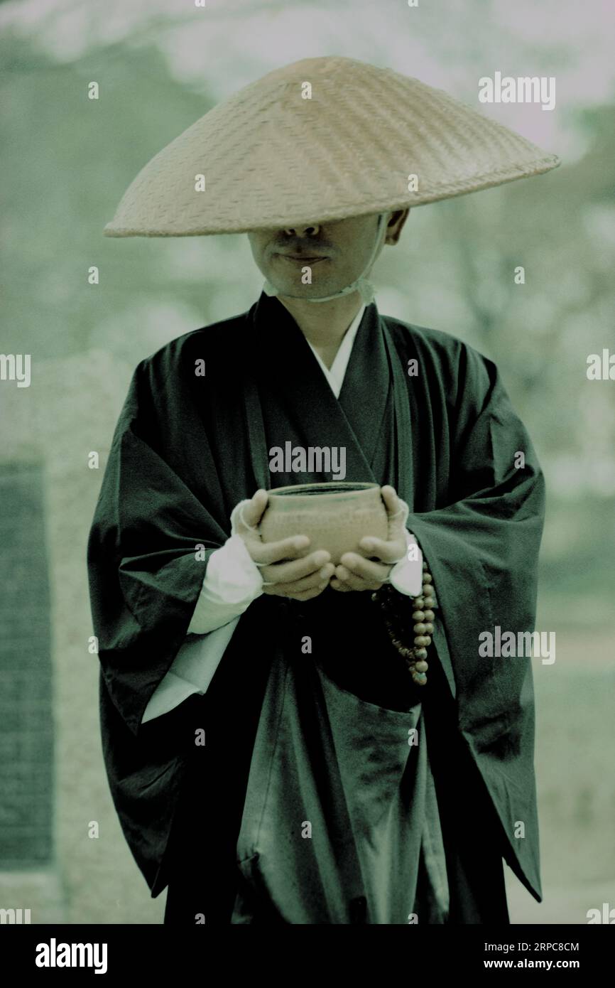 Japanese priest outside of the temple in Nara Stock Photo - Alamy