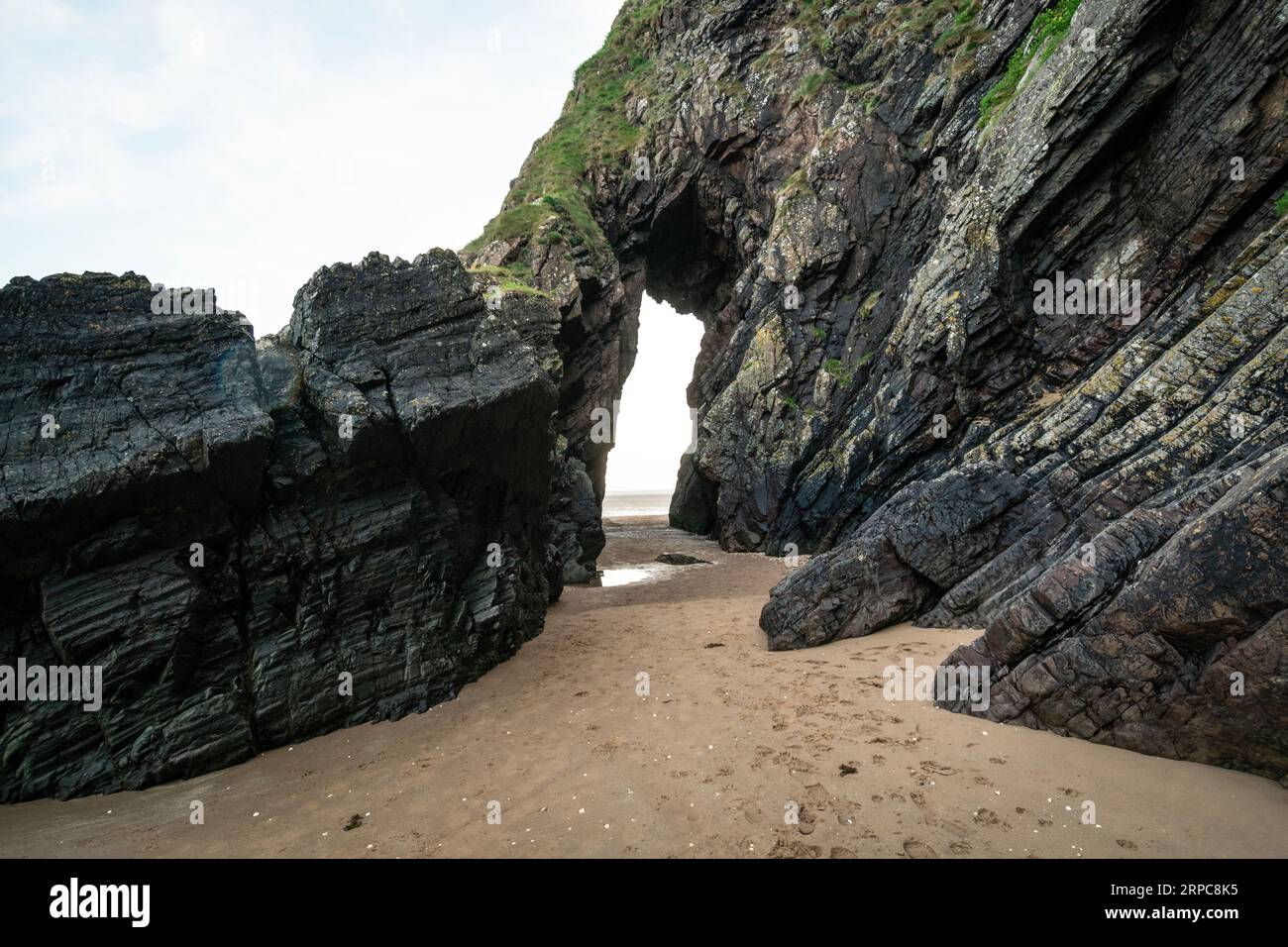 Needles Eye natural rock arch near Sandyhills, Dumfries & Galloway ...