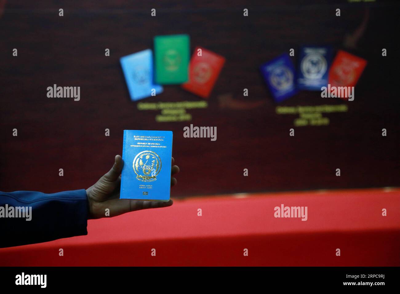 (190628) -- KIGALI, June 28, 2019 -- A person holds a Rwanda East ...