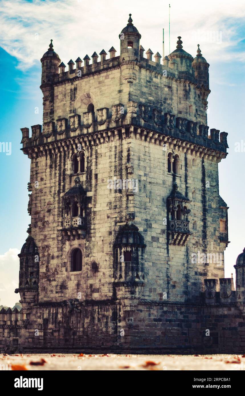 An ornate high-rise building with multiple turrets and a large clock ...