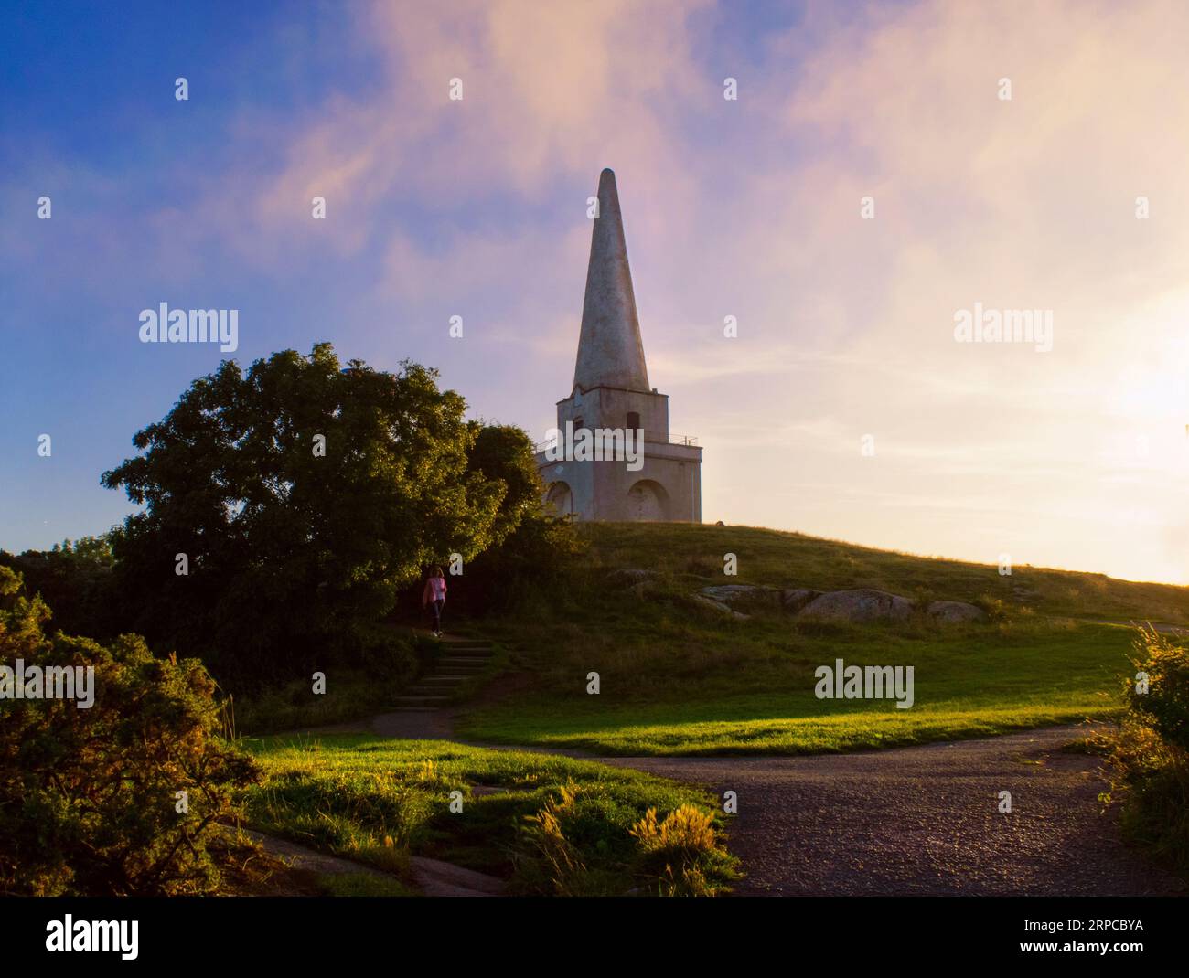 A scenic view of an iconic monument in front of a long path in an ...