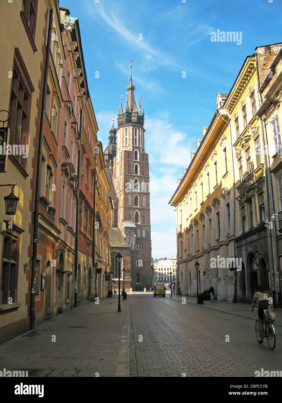 view of Florianska street and towers of St. Mary's Basilica, Krakow ...