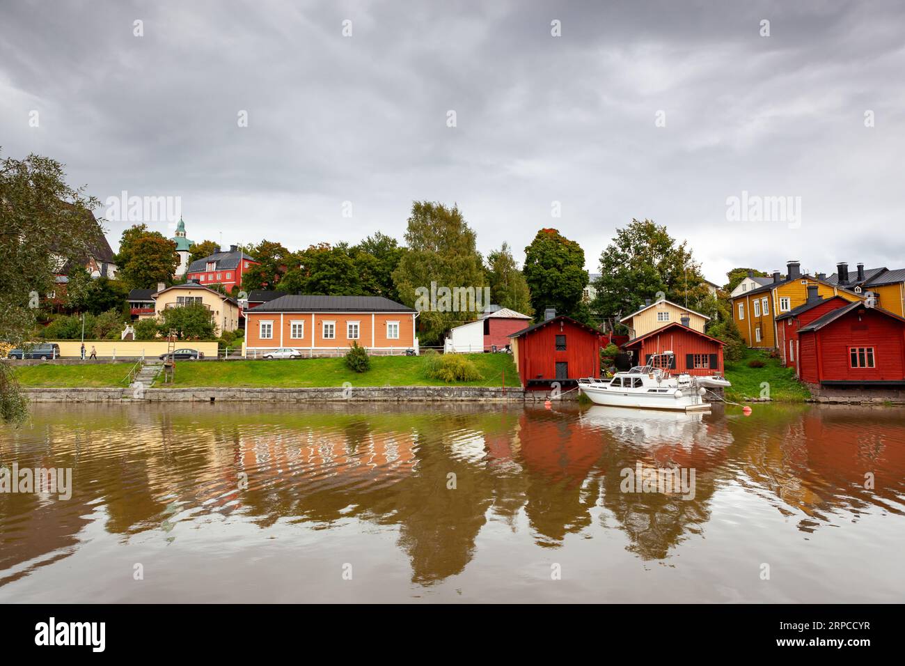 Classic old wood houses and church. Riverside view at Porvoo, Finland ...
