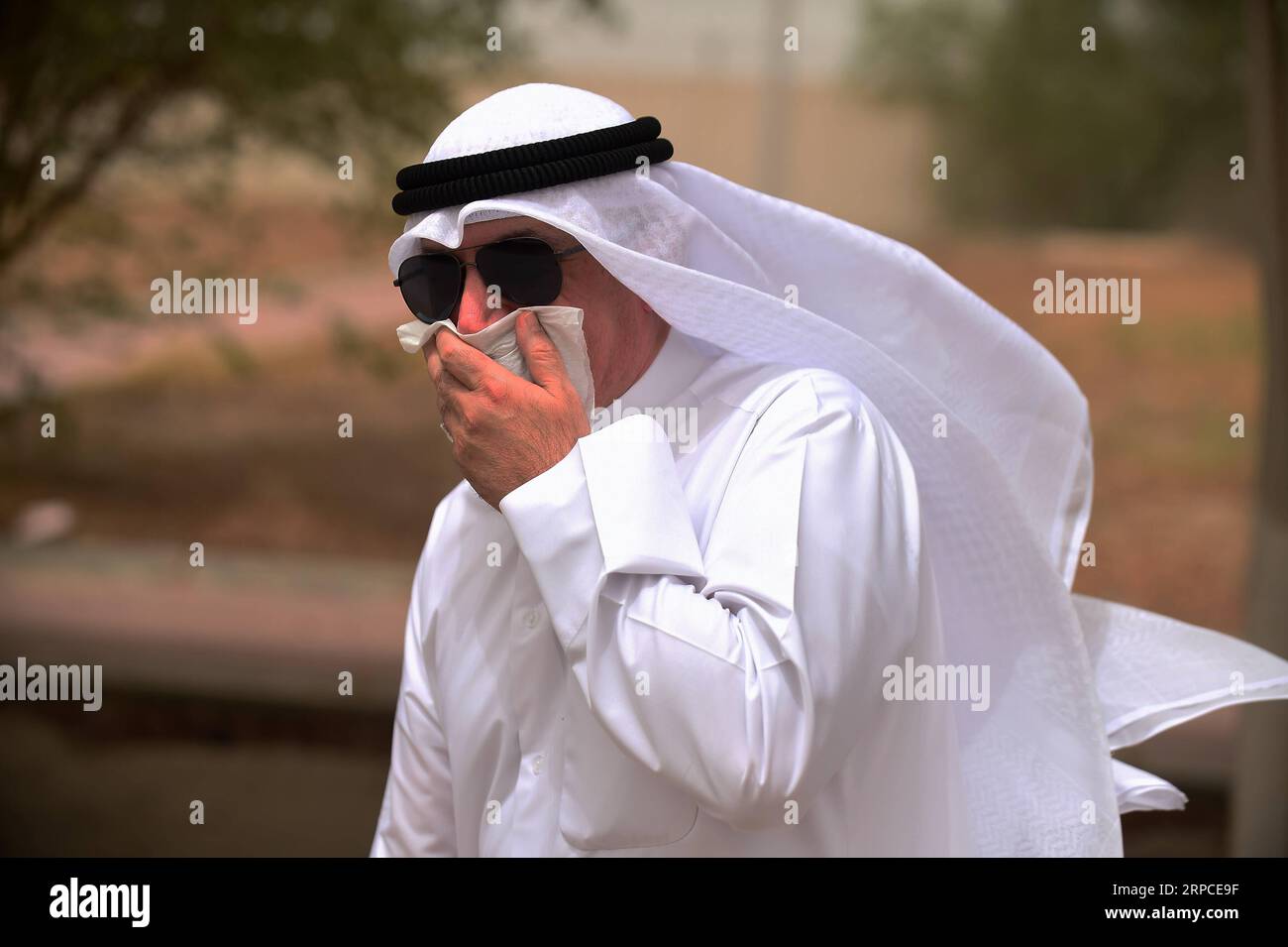 (190702) -- KUWAIT CITY, July 2, 2019 -- A local resident walks in ...