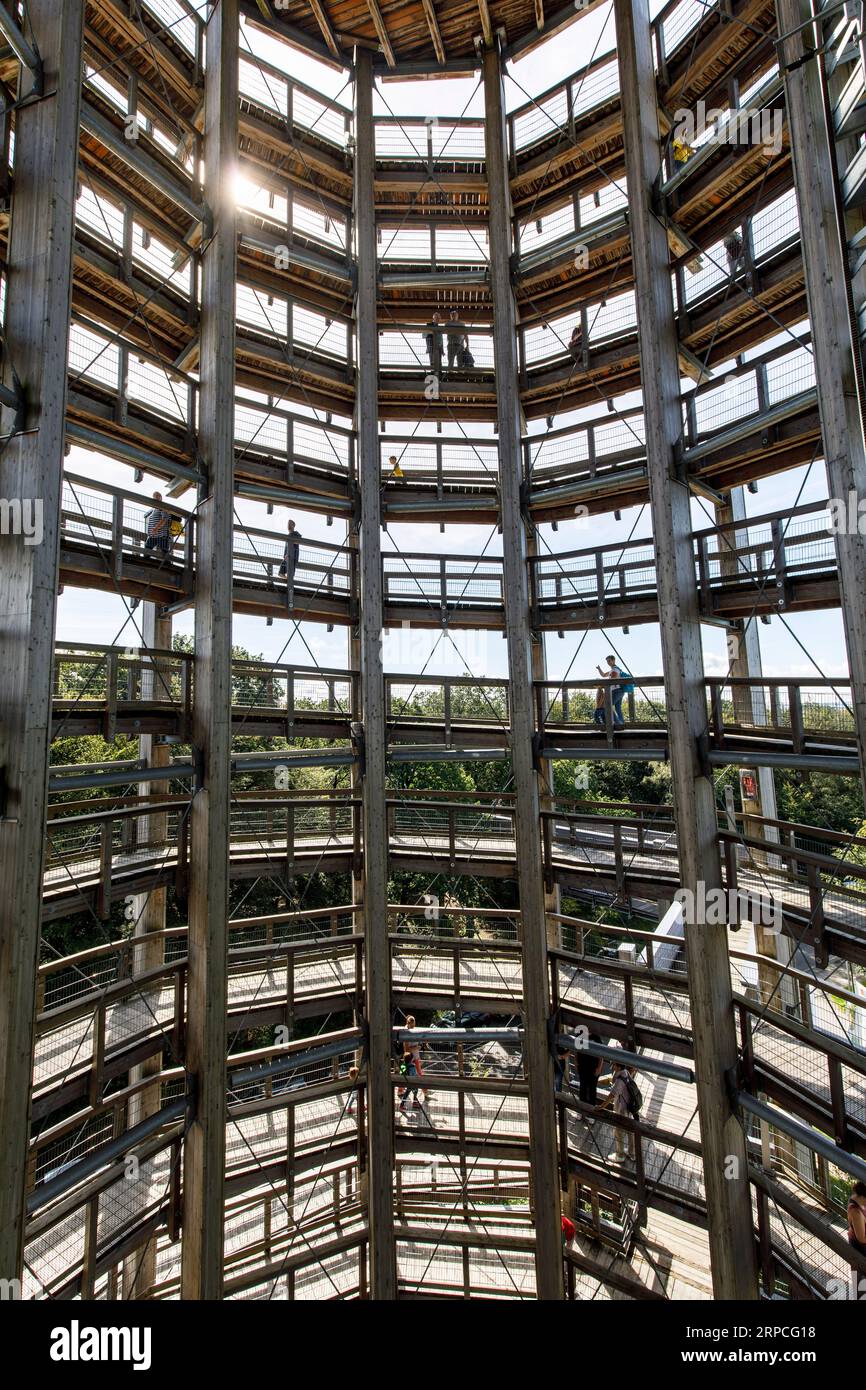 visitors walking inside the 40-meter-high observation tower, part of ...