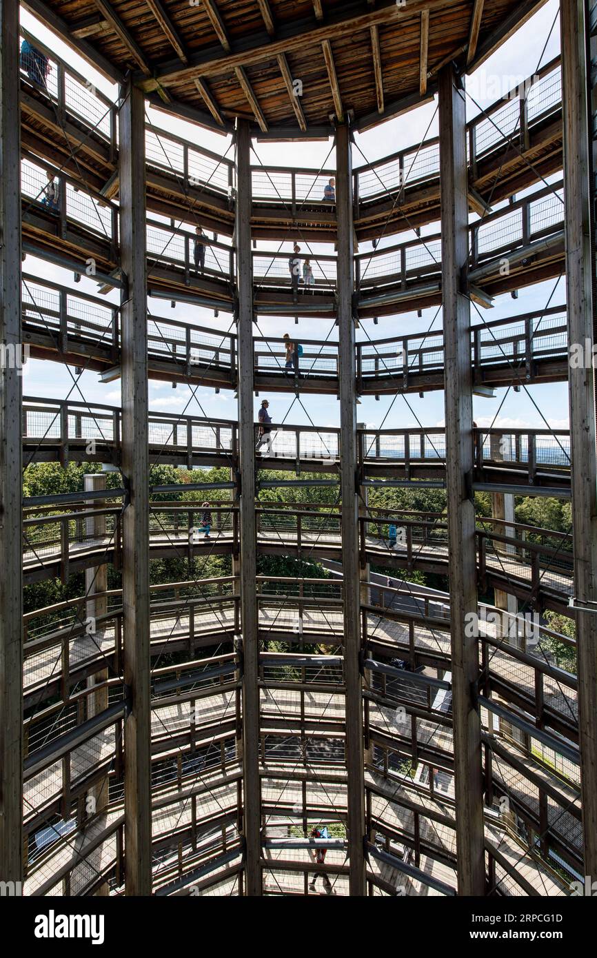 visitors walking inside the 40-meter-high observation tower, part of ...