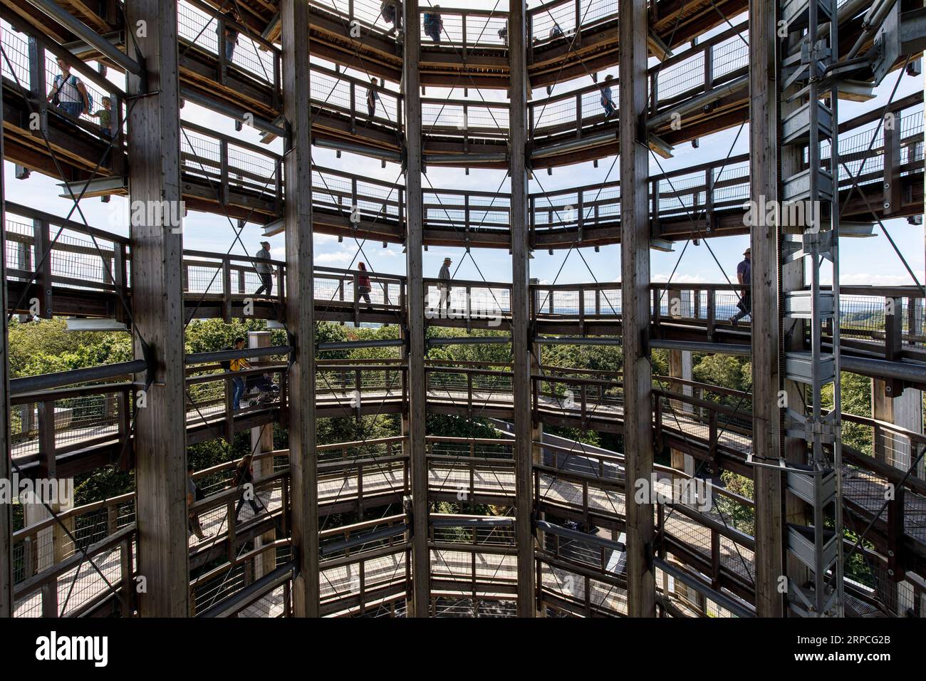 visitors walking inside the 40-meter-high observation tower, part of ...