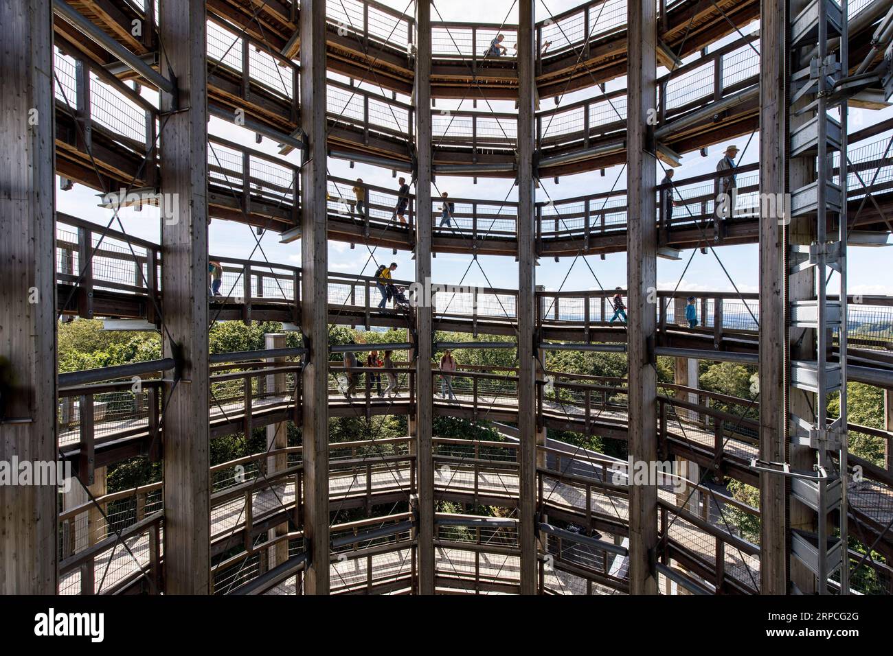 visitors walking inside the 40-meter-high observation tower, part of ...