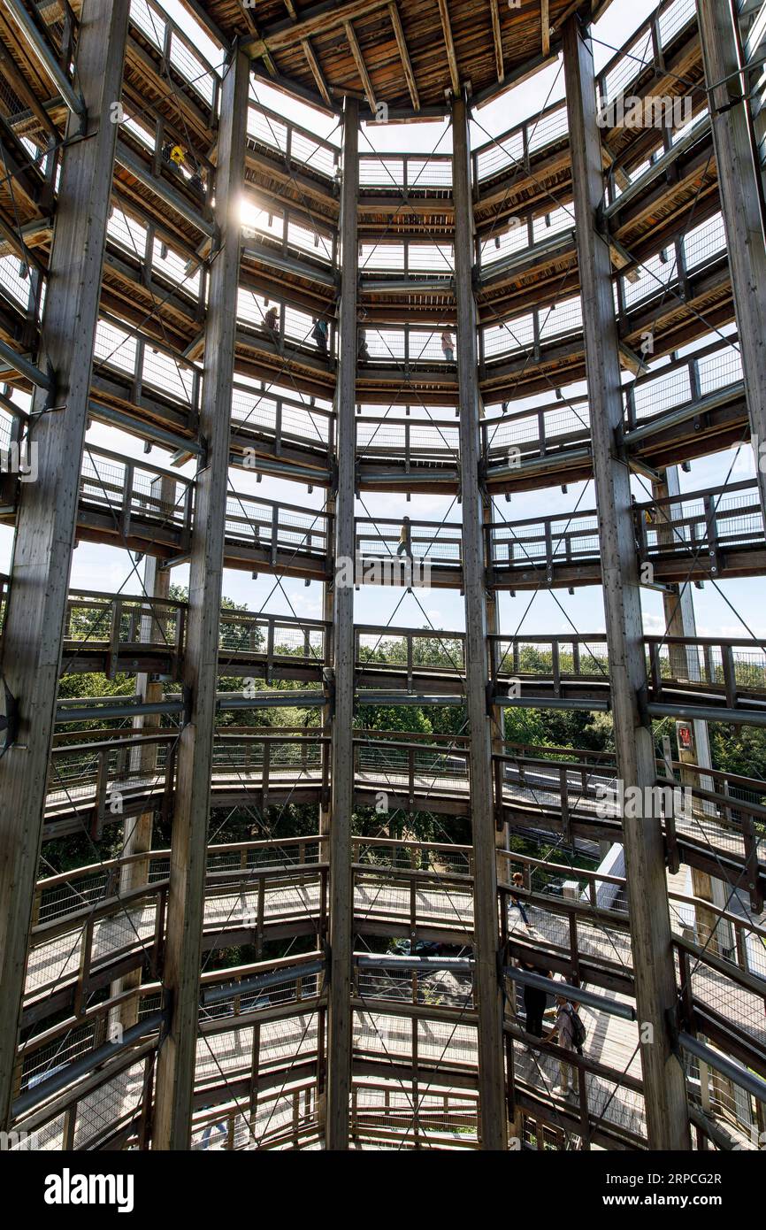 visitors walking inside the 40-meter-high observation tower, part of ...