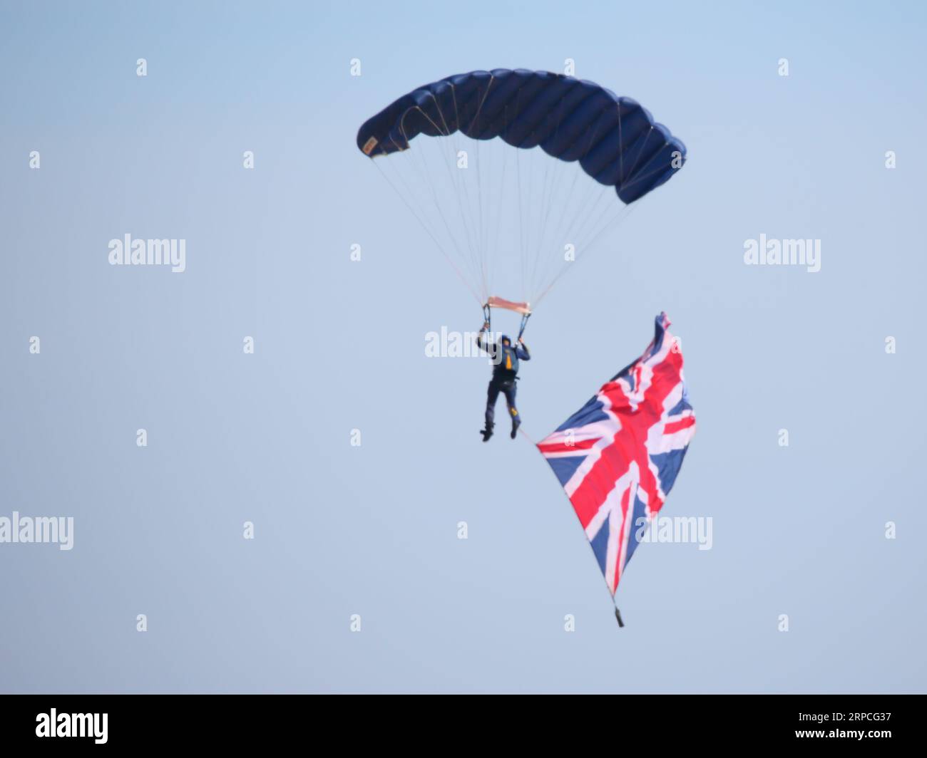 The Army parachute team flying the British flag at the Bournemouth Air ...