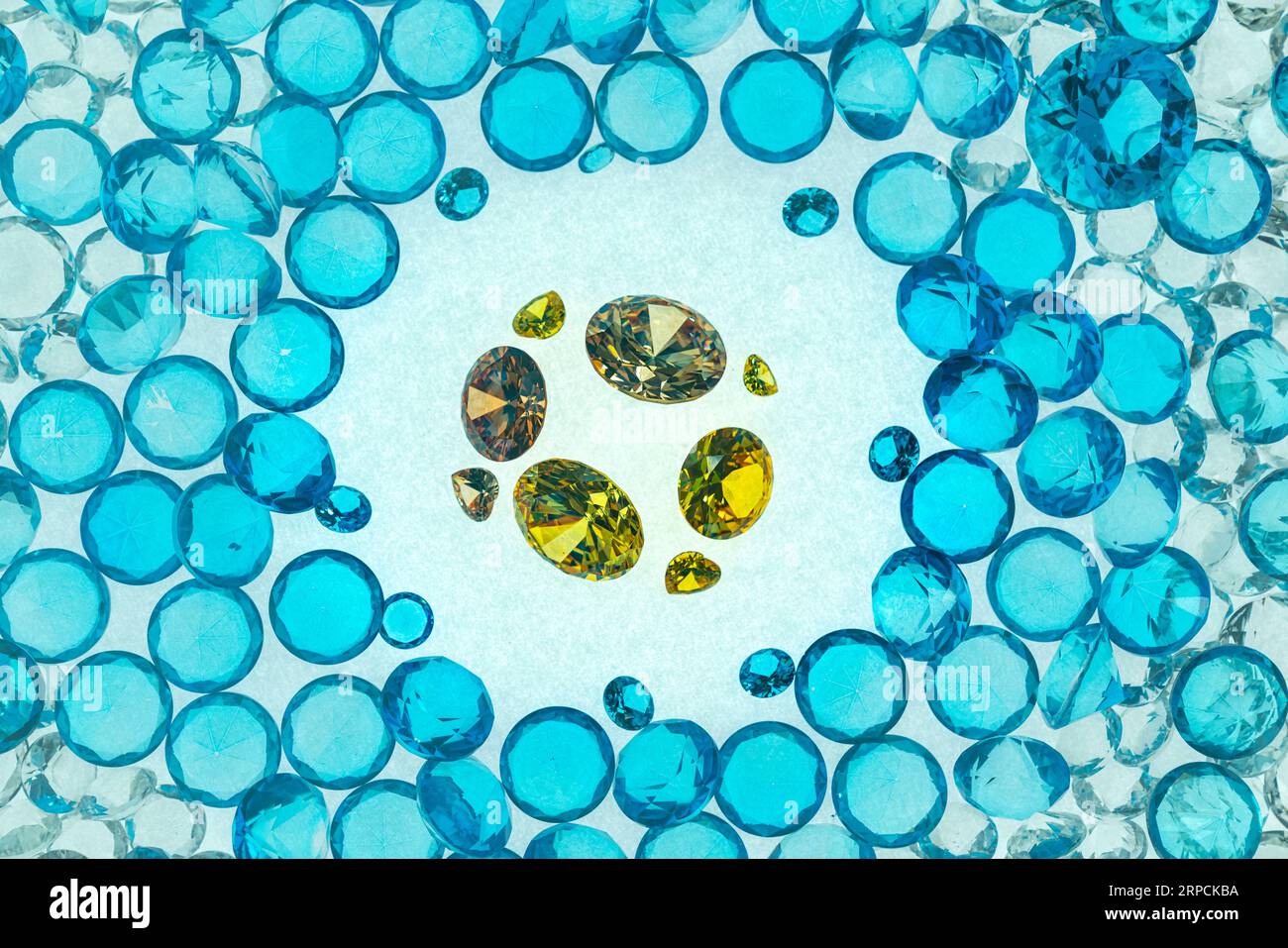 A group of Golden diamonds arranged in a row in front of white diamonds ...