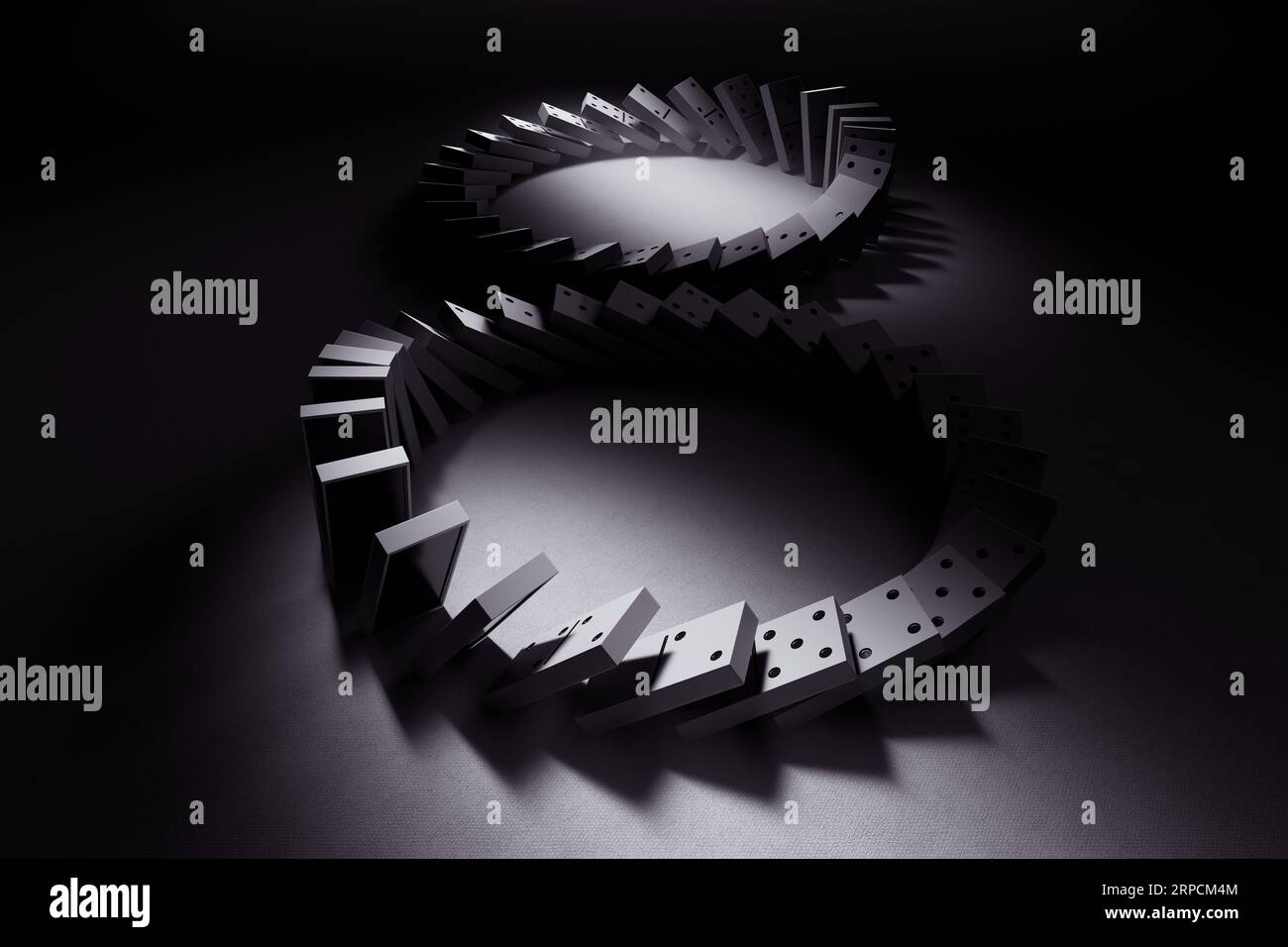 Domino loop falling in moody lighting creates intricate shadows and ...