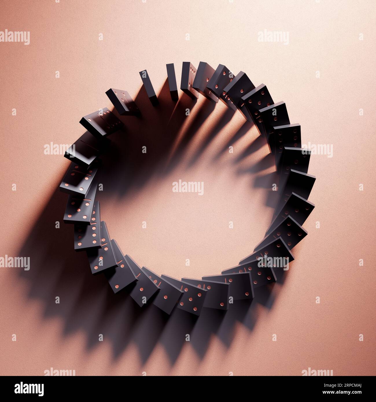 Domino loop falling in moody lighting creates intricate shadows and ...