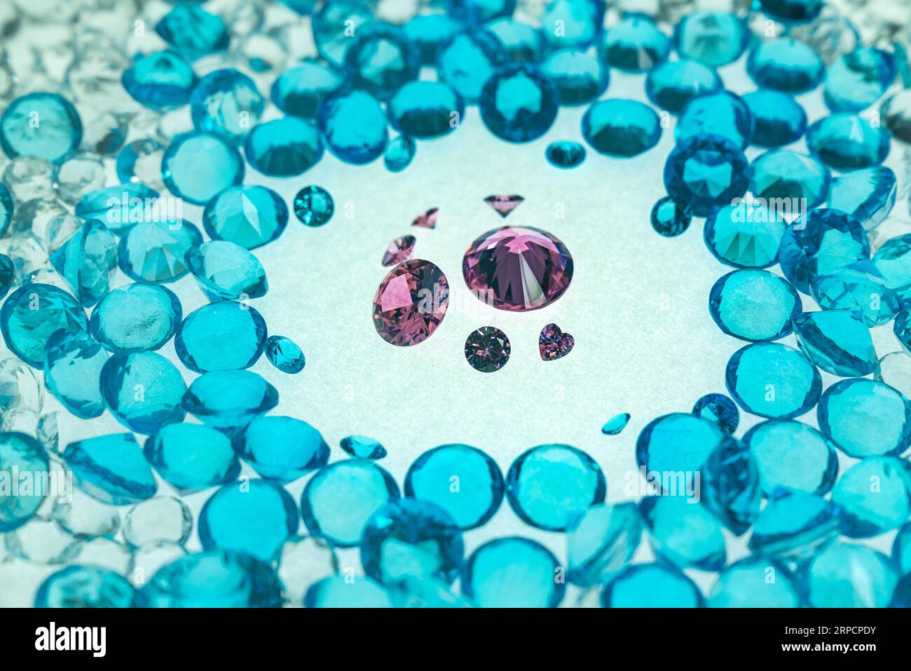 A group of pink diamonds arranged in the middle of blue diamonds in a ...