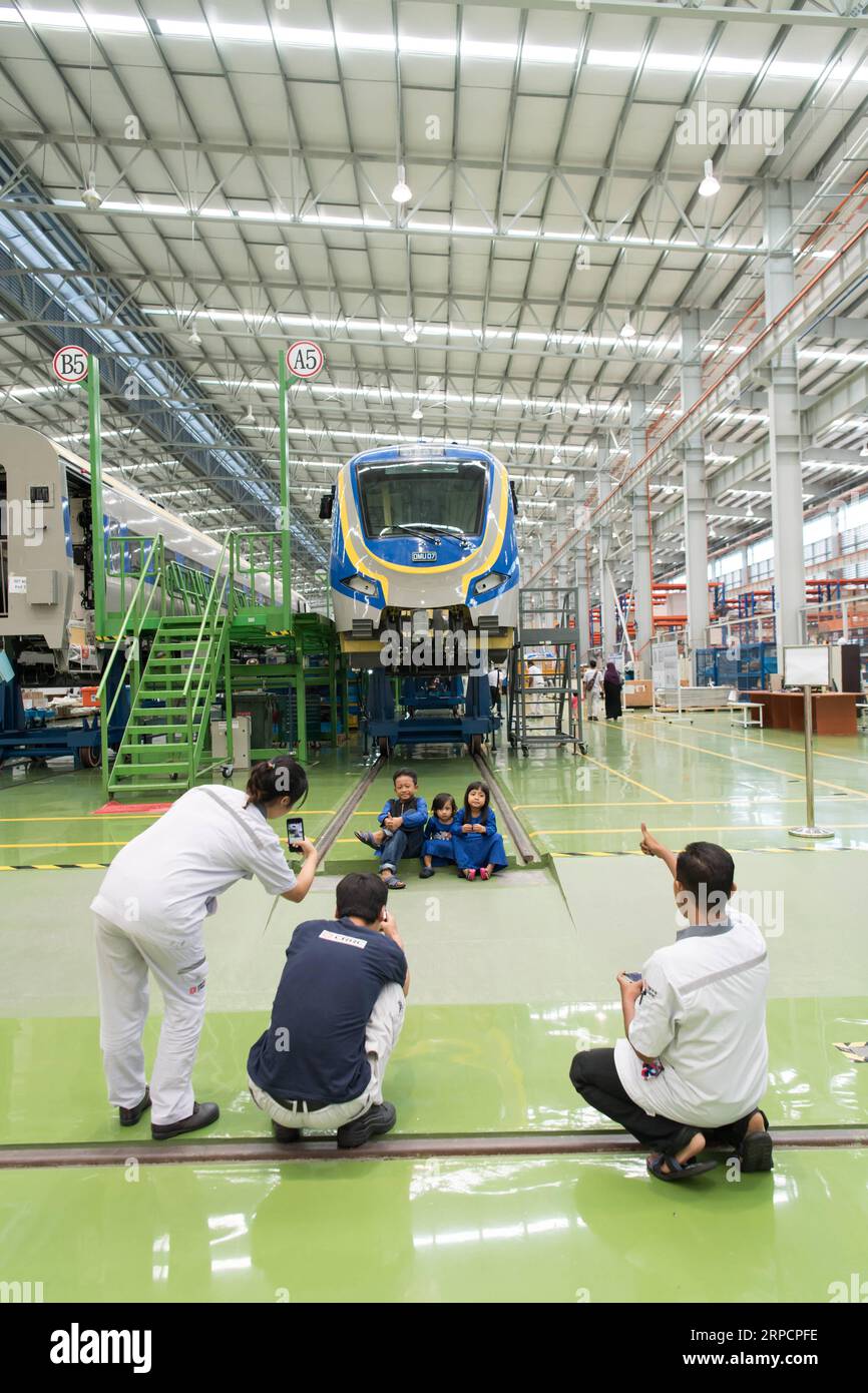 (190711) -- BATU GAJAH, July 11, 2019 -- Children of workers from the ...