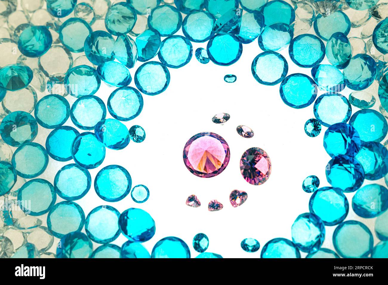 A group of pink diamonds arranged in the middle of blue diamonds in a ...
