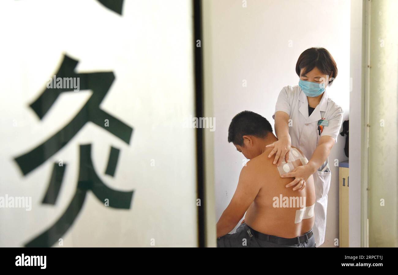 (190712) -- ZIBO, July 12, 2019 -- A man receives sanfutie treatment in ...