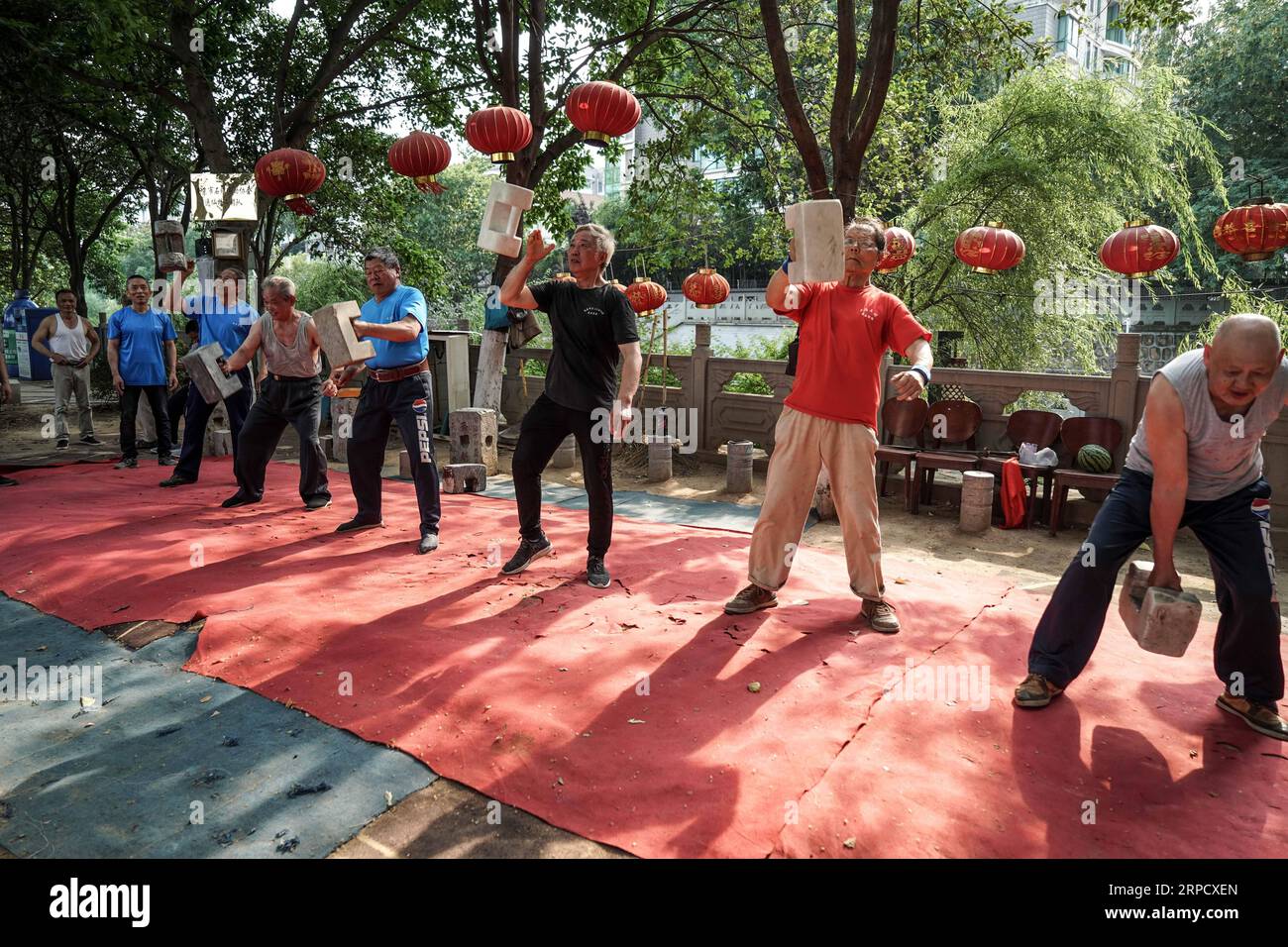 (190715) -- NANJING, July 15, 2019 -- Liang Zhenxin (3rd R) and a group ...