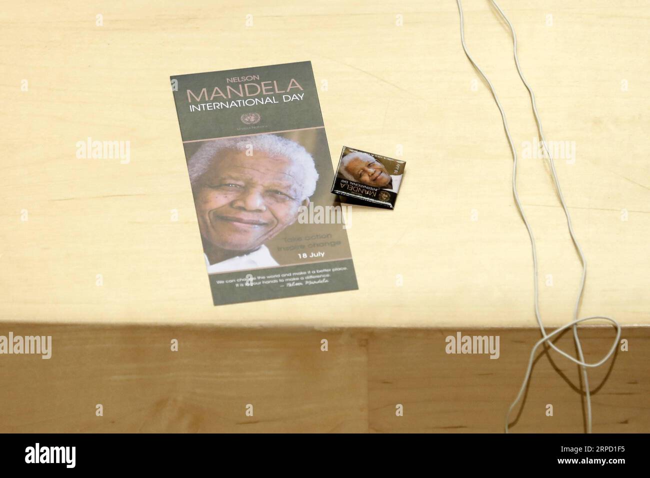 (190718) -- UNITED NATIONS, July 18, 2019 -- A poster and a pin of ...