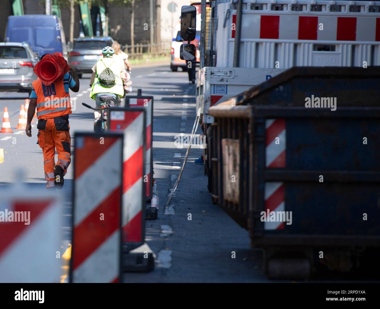 Berlin, Germany. 04th Sep, 2023. A worker walks on Schönhauser Allee ...