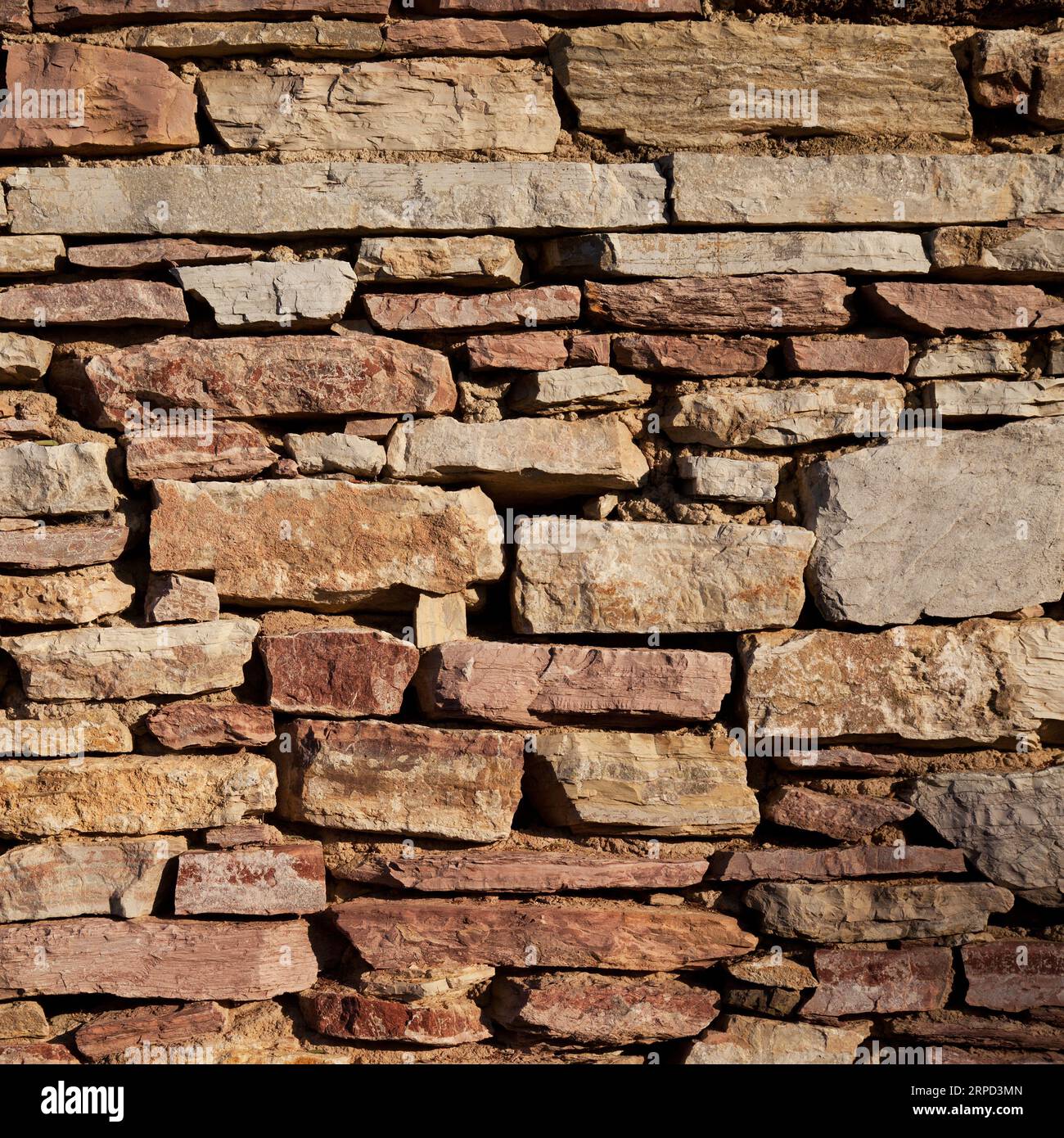 Sturdy blue and beige cut stone wall made in Datca, Turkey, good for ...