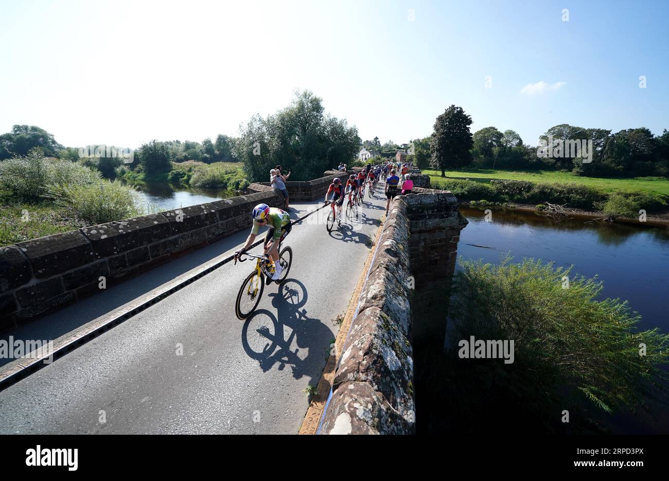 Wout van Aert of Team Jumbo-Visma in the peloton group as it goes over ...