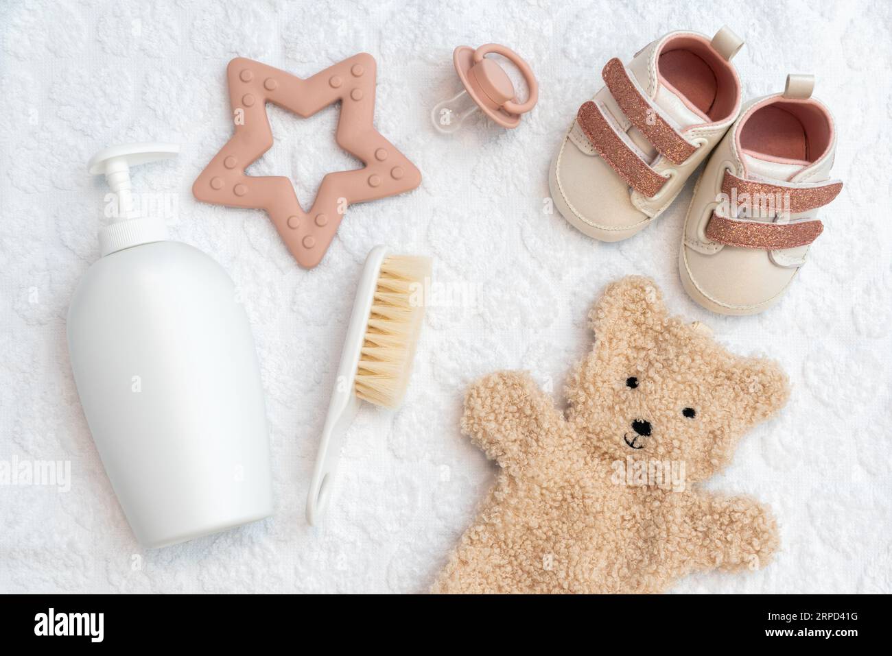 Newborn's world in a snapshot, top view of infant accessories arranged ...