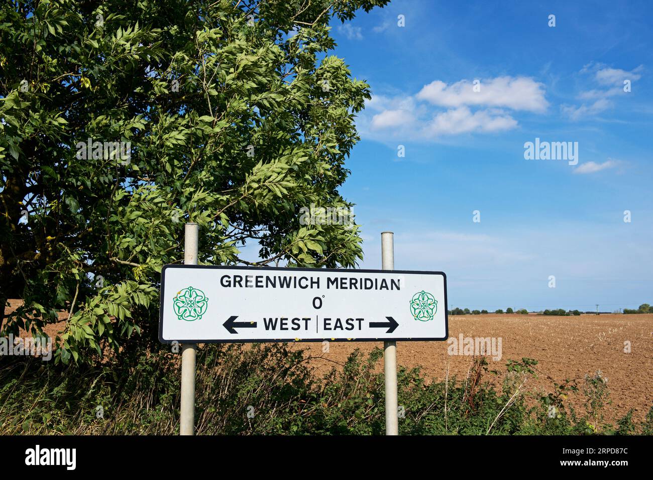 Sign for the Greenwich Meridian, just outside the village of Patrington ...