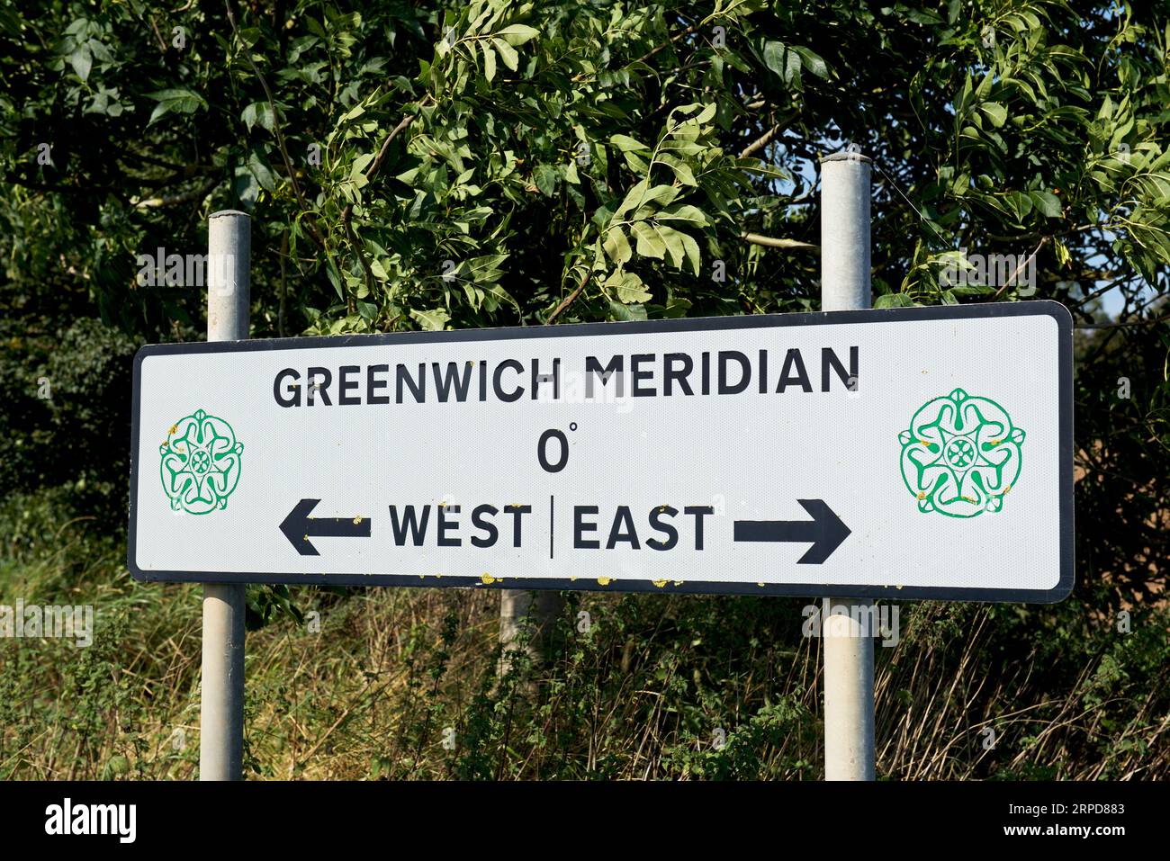 Sign for the Greenwich Meridian, just outside the village of Patrington ...
