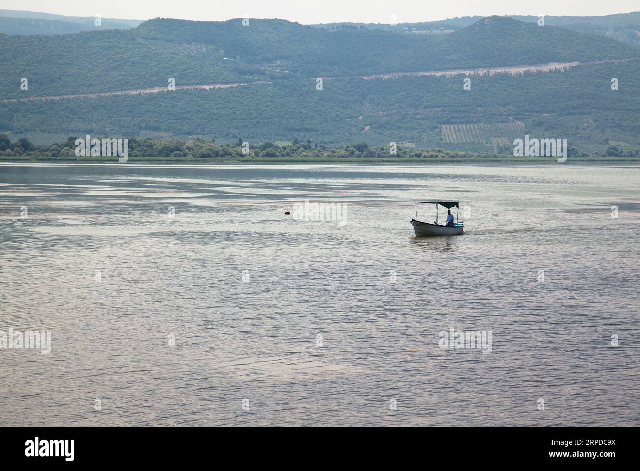 Touristic sightseeing wooden boats around Ulubat or Uluabat Lake in ...